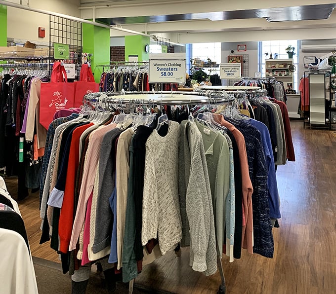 Racks of possibility await inside Outfitters. Those $5 sweaters might just fund your next coffee table rescue mission.