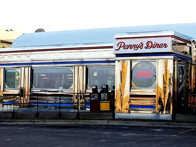 This shiny diner car looks ready to serve up nostalgia alongside perfectly fluffy pancakes and strong coffee.