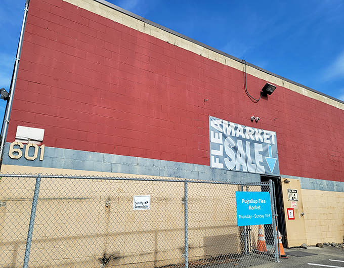 Red brick buildings house endless possibilities at Puyallup Flea Market, where every booth tells a different collector's story.
