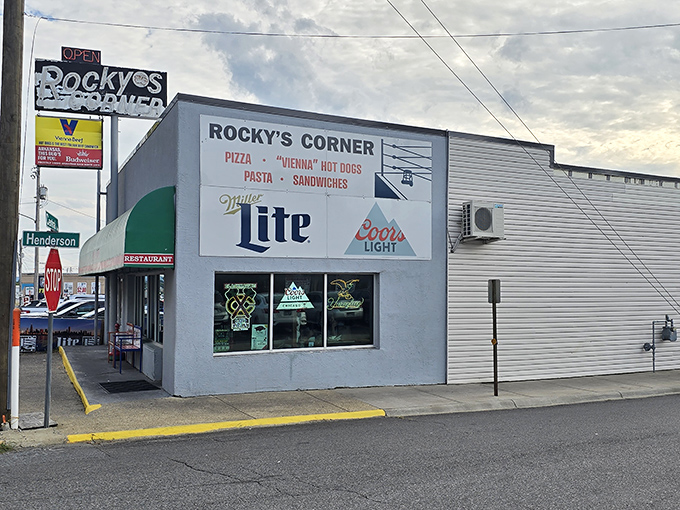 Sports fans and pizza lovers unite! Rocky's Corner serves up slices with a side of nostalgia under those classic beer signs.