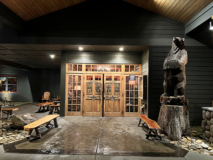 By day or night, Saskatoon's lodge-like entrance and wooden bear guardian set the stage for a meal on the wild side.