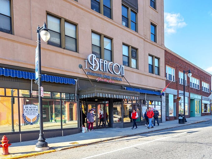 In Woonsocket, this building is a school for the arts, where creativity meets classic charm, inspiring the next generation amid red velvet and stunning architecture.