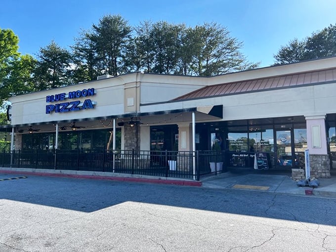 Morning sunshine highlights Blue Moon's storefront &ndash; where families gather for that magical moment when the server brings out steaming pies to waiting tables.