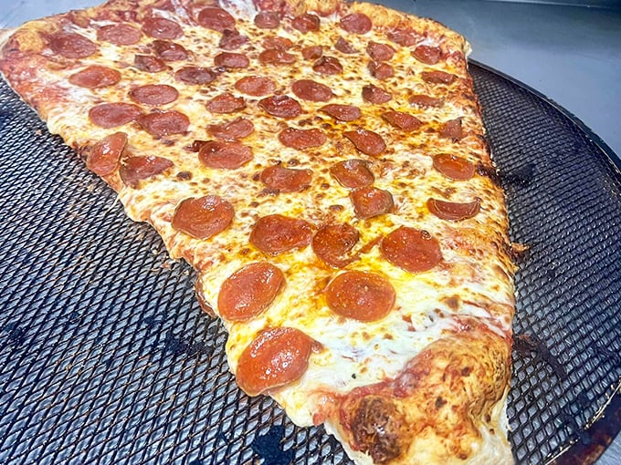 Not so much a slice as a personal pizza continent. Scientists are still debating whether it has its own gravitational pull.