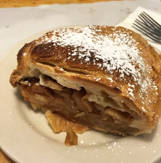 Not your grandmother's apple pie (unless your grandmother was a pastry genius). Flaky, golden crust hiding a treasure of cinnamon-kissed apples.