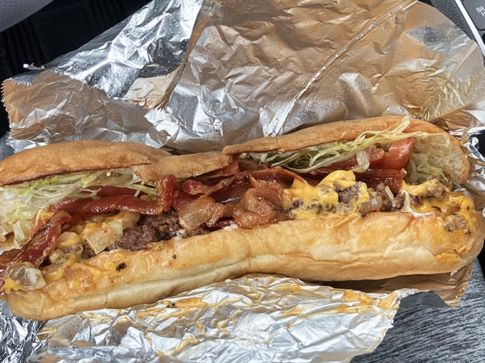 This Bacon Chopped Cheese isn't just a sandwich – it's an architectural marvel of crispy edges, melty cheese, and bacon that demands respect.