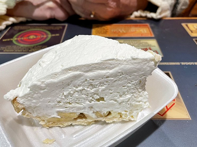 Cloud-like meringue towers over creamy pie filling &ndash; this isn't just dessert, it's architecture with a sweet purpose that would make any grandma proud.