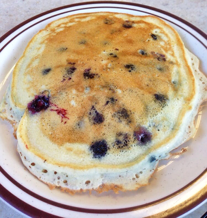 The star of the show: a blueberry pancake that makes all other breakfast foods jealous. Those purple bursts aren't just berries &ndash; they're flavor bombs.