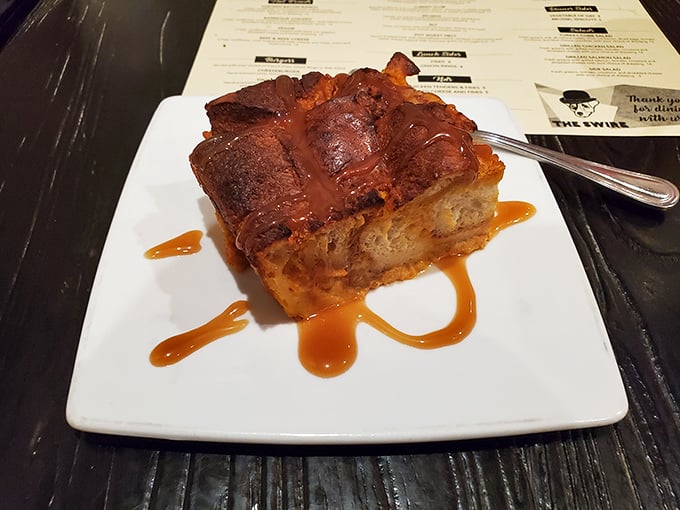 Bread pudding that doesn't just speak to you—it writes love sonnets. That caramel sauce is performing interpretive dance across the plate.