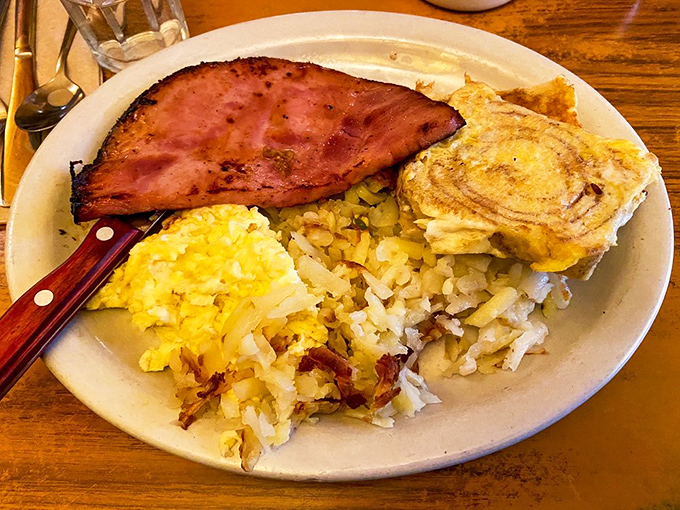 This isn't breakfast for Instagram &ndash; it's breakfast for life. Perfectly cooked eggs, crispy hash browns, and ham that would make your cardiologist wince but your soul sing.