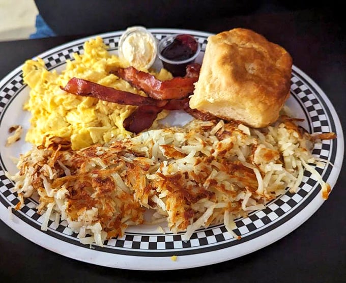 Breakfast perfection on a plate: golden hash browns with edges so crispy they practically sing, eggs that sunshine your morning, and bacon that means business.