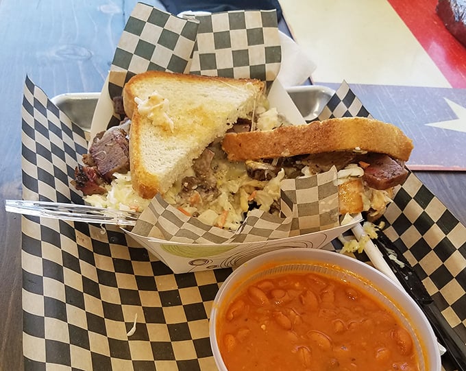 This sandwich isn't just food; it's architecture&mdash;layers of smoky goodness with beans on the side that didn't come from any can.