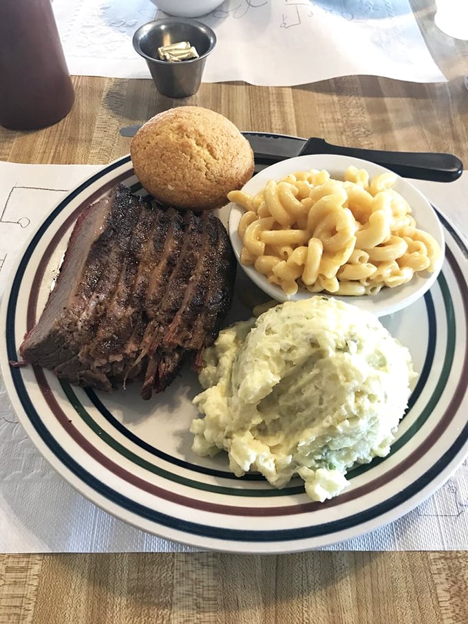 Brisket so tender it practically surrenders to your fork. Paired with mac & cheese and potato salad, it's the holy trinity of comfort.