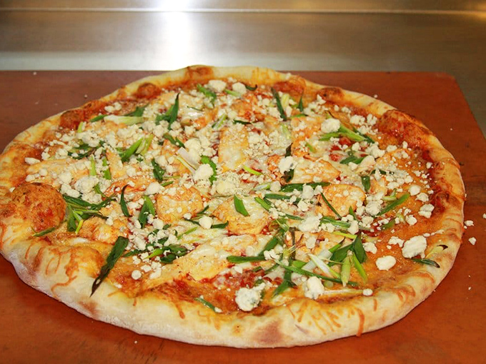 Pizza perfection doesn't need a fancy address. This pie's golden crust and fresh toppings would make an Italian grandmother nod in approval.