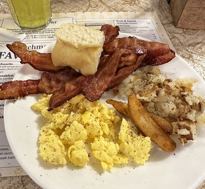 Bacon, eggs, hash browns, and a biscuit&mdash;this breakfast plate understands that morning meals aren't the time for restraint.