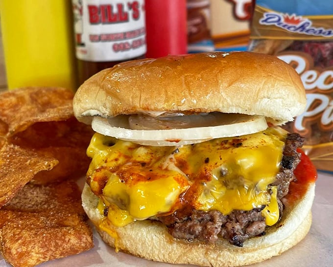 This isn't just a cheeseburger&mdash;it's edible poetry with crispy edges, melty American cheese, and a soft bun that's witnessed decades of burger perfection.