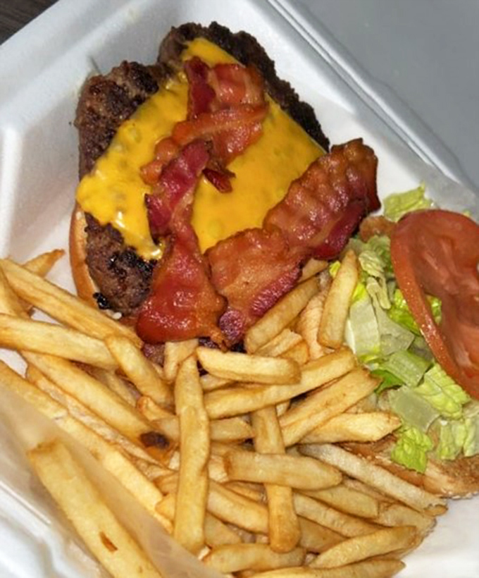 Behold the cheeseburger in its natural habitat&mdash;crispy bacon, melted cheese, and a hand-formed patty that puts fast food imposters to shame.