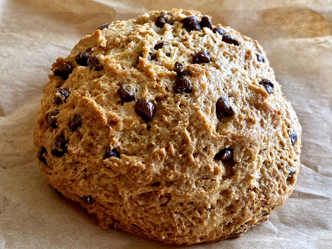 This chocolate chip scone isn't just a pastry—it's an event. The perfect balance of crumbly exterior and tender heart, like the best rom-com characters.