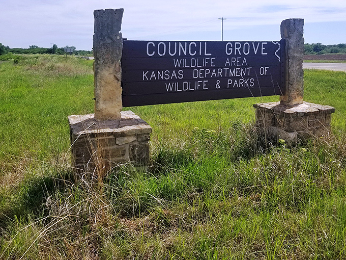 Nature doesn't need neon signs to announce its wonders. This understated entrance leads to acres of Kansas wildlife waiting to be discovered.
