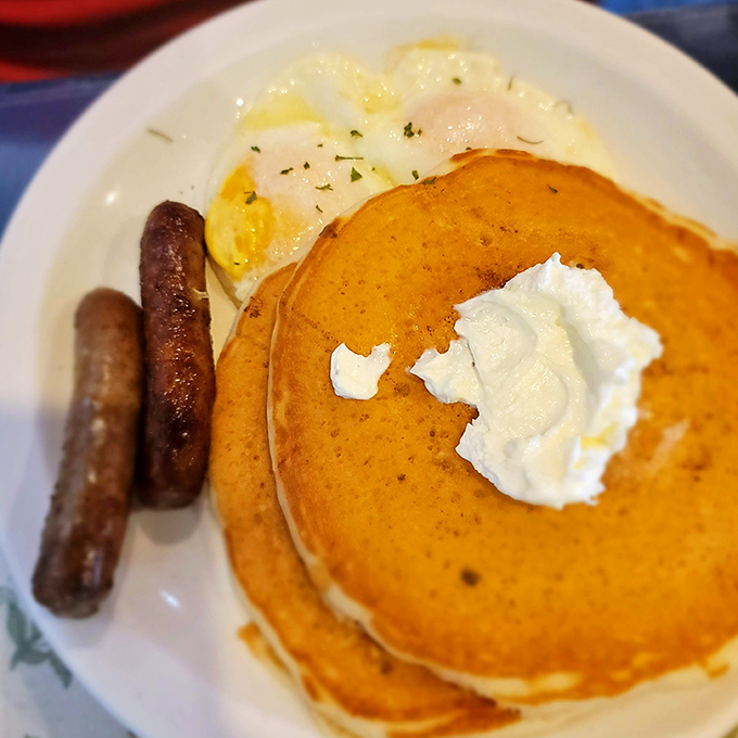 Golden pancakes, perfectly browned sausage, and eggs sunny-side up&mdash;the breakfast trinity that makes Monday mornings bearable and Sunday mornings sacred.