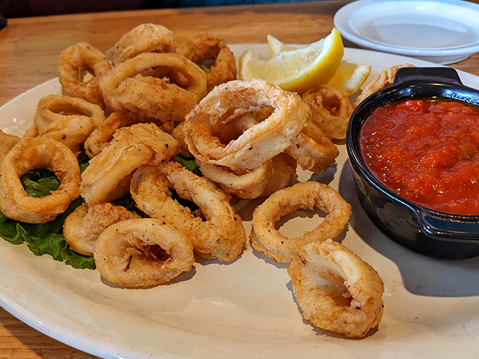 The star of the show: calamari that achieves that mythical balance of crispy exterior and tender squid. Like a perfectly choreographed seafood ballet on your plate.