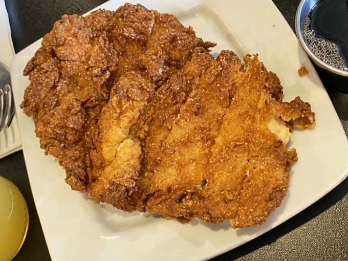 Golden-brown fried chicken that's audibly crunchy from across the room. Colonel Sanders would weep with both joy and professional jealousy.