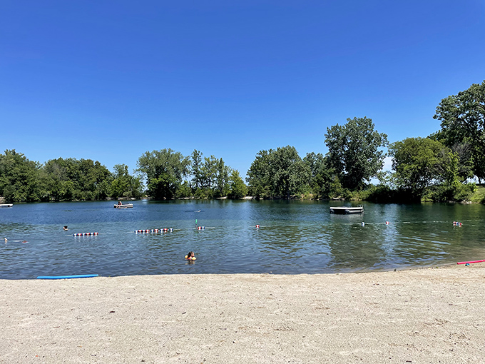Summer bliss defined: Genoa Quarry's crystal-clear waters provide a refreshing escape that makes air conditioning seem entirely overrated.
