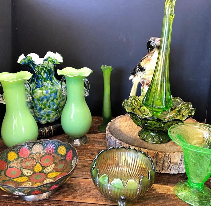 Jade-colored glassware that makes modern reproductions look like imposters. Each piece practically glows with the patina of countless dinner parties.