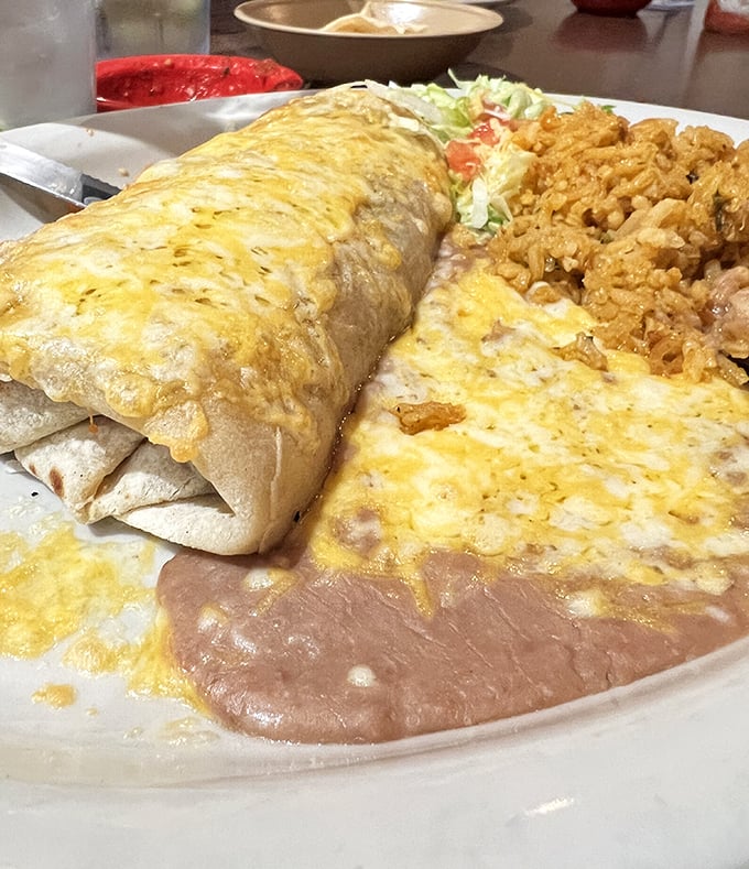 Behold the legendary green chili burrito &ndash; where cheese meets tortilla in a relationship so perfect it deserves its own reality show.
