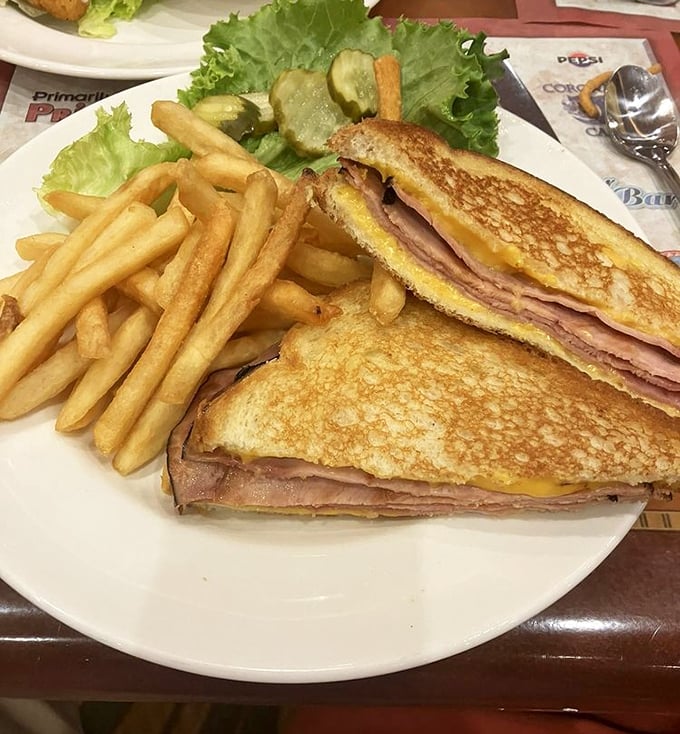 This grilled ham and cheese doesn't need a fancy name or truffle oil to prove its worth &ndash; just perfectly melted American cheese and crispy bread.