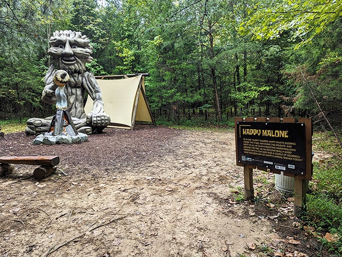 Happy Malone's campsite invites weary hikers to rest awhile. That expression says, "I've seen things in these woods that would make your Instagram followers jealous."