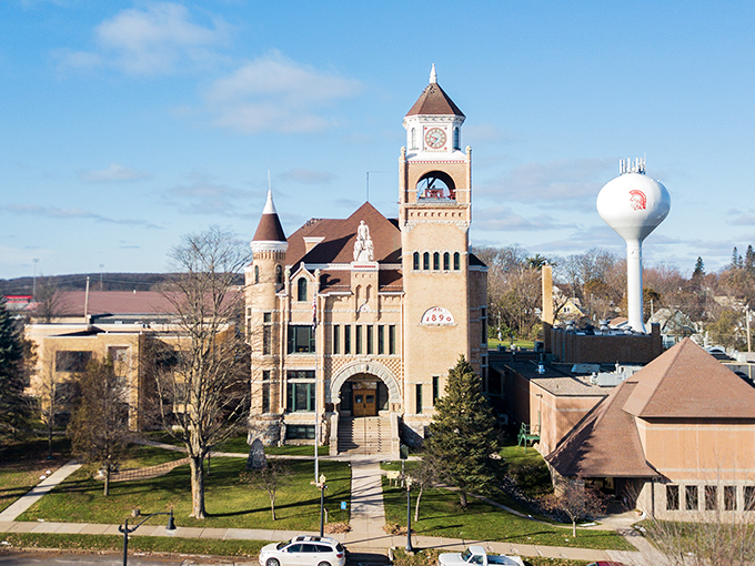 The Iron County Courthouse stands like a European castle transplanted to the northwoods, its clock tower keeping time for generations of locals.