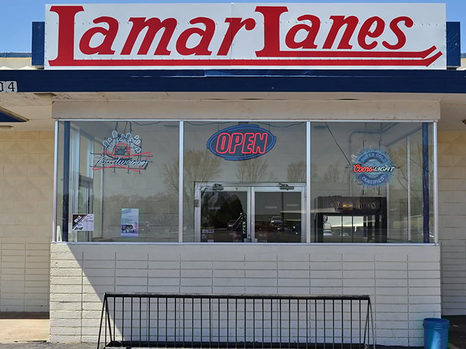 Lamar Lanes proves bowling never goes out of style in small-town America. The neon "OPEN" sign might as well read "Come roll back the years."
