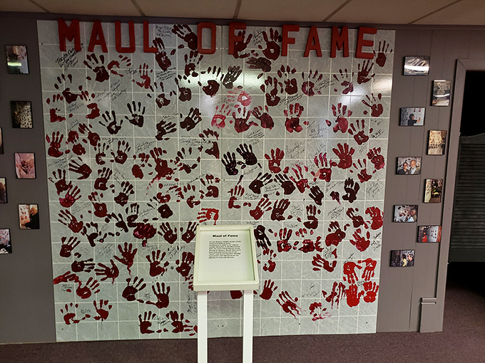 The "Maul of Fame" wall features handprints from zombie royalty. It's like Hollywood's Walk of Fame, but with considerably more fake blood.
