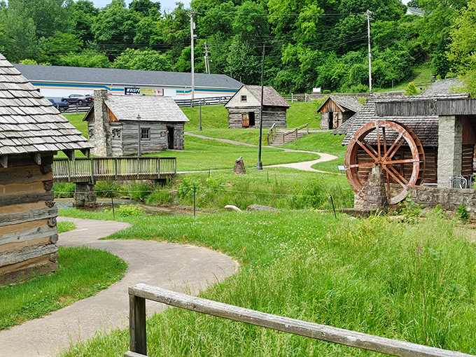 Old Bardstown Village offers a glimpse into pioneer life, complete with log cabins and a water wheel that never asks for WiFi.