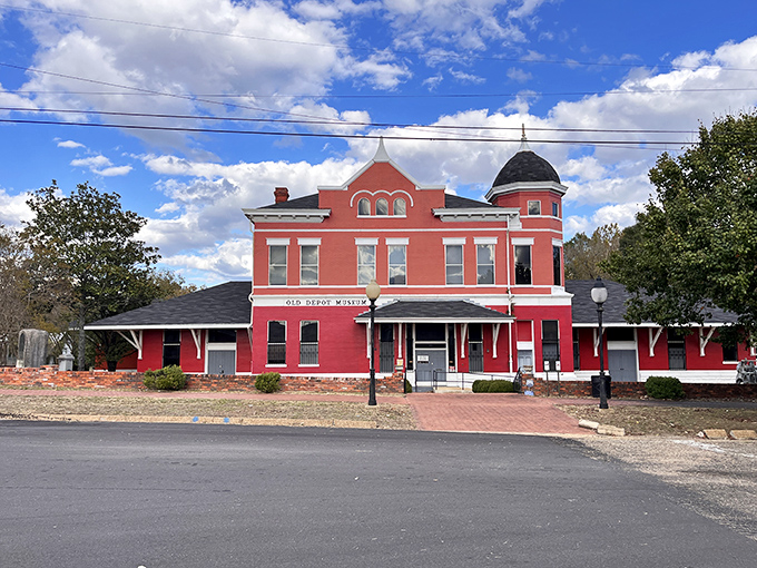 The Old Depot Museum's striking Victorian architecture showcases Selma's railroad heritage, its brick-red facade and ornate details a photographer's dream against Alabama's blue skies.