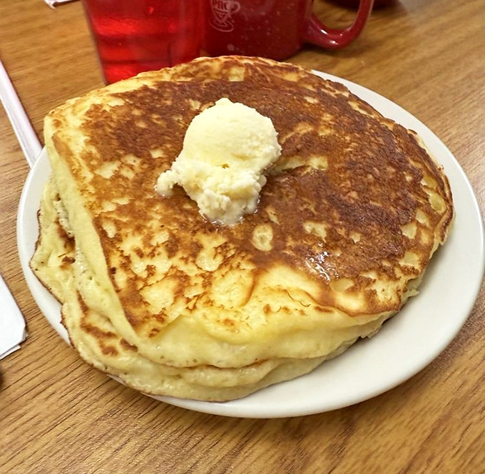 Behold the famous Heavenly Hot Cakes in their golden glory. That butter melting on top isn't just garnish&mdash;it's performing a delicious swan song.