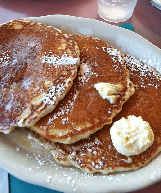 Pancake perfection doesn't happen by accident. These golden-brown beauties with their melting butter pats are what breakfast dreams are made of&mdash;no alarm clock required.
