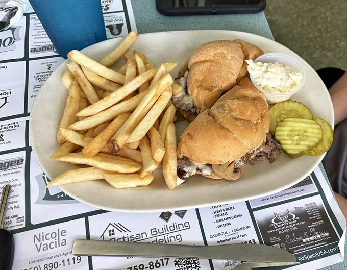 This Philly sandwich doesn't mess around &ndash; tender beef, melty cheese, and enough fries to feed a small nation. Diet starts tomorrow!