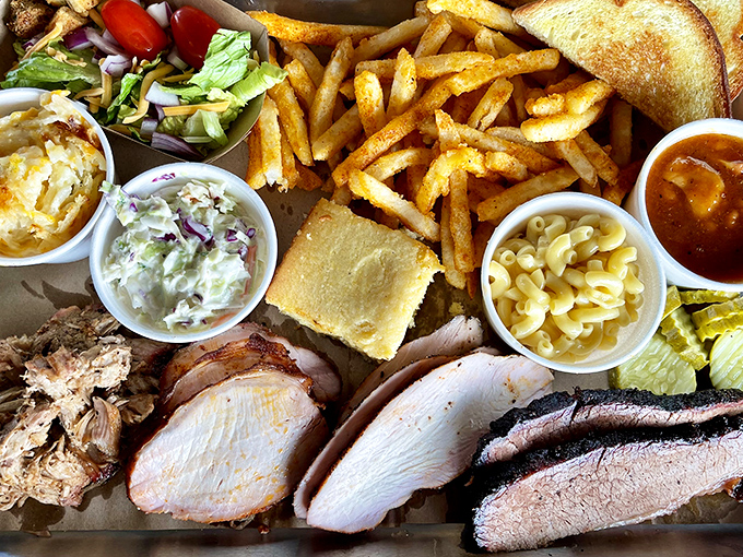 Behold the carnivore's dream team: brisket, turkey, pulled pork, and all the fixings. This isn't a meal; it's a celebration on a tray.