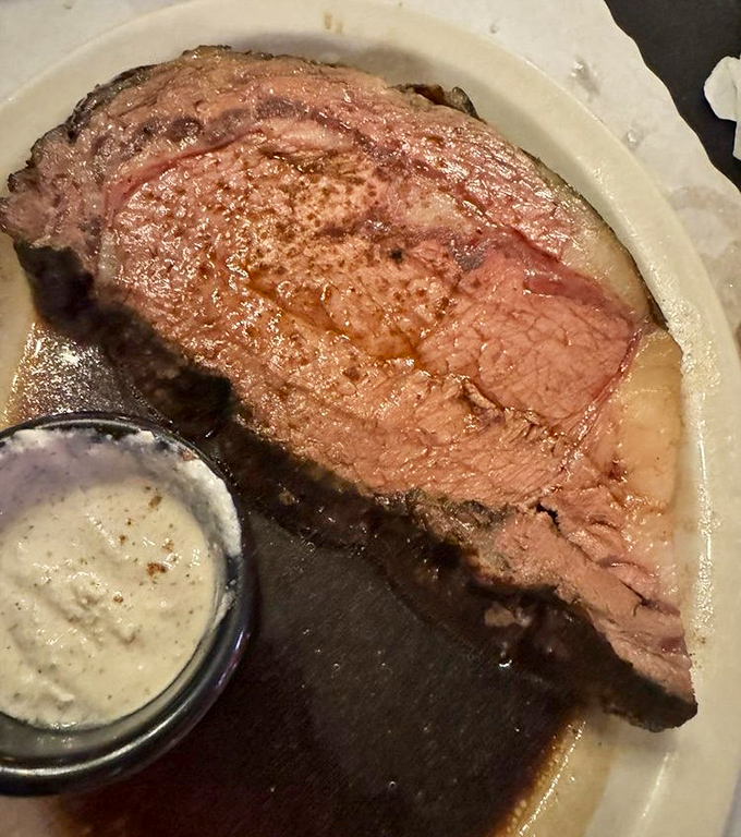 This prime rib isn't just dinner; it's a religious experience. Perfectly pink, juicy, and accompanied by a sauce that should be illegal in several states.
