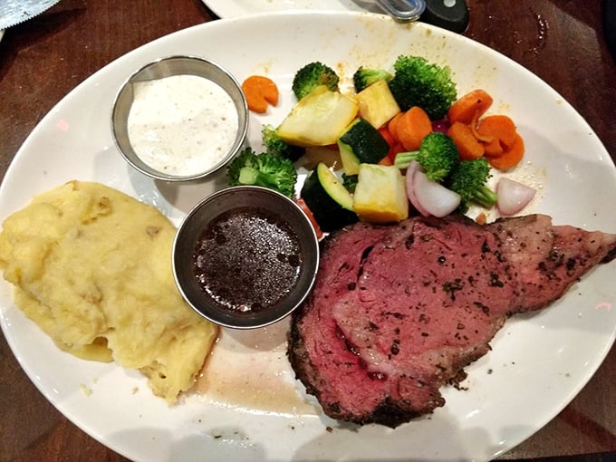 The star of the show: prime rib so perfectly pink it could make a vegetarian question their life choices. Those little cups of horseradish and au jus? Non-negotiable companions.