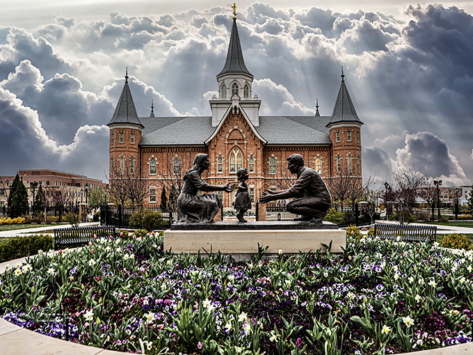 The Provo City Center Temple rises like a phoenix from historic foundations, surrounded by gardens that would make any landscape architect weep with joy.