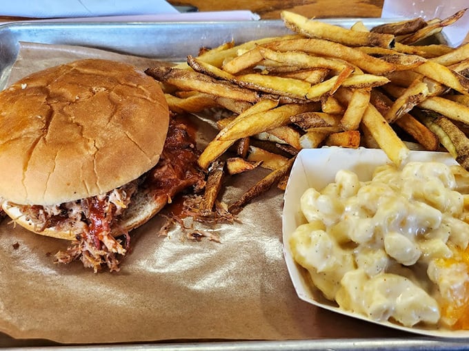 Behold the pulled pork sandwich in all its messy, magnificent glory&mdash;proof that perfection doesn't need fancy presentation, just phenomenal flavor.