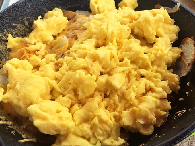 These scrambled eggs aren't just cooked, they're orchestrated &ndash; fluffy golden clouds that make you question all eggs prior.