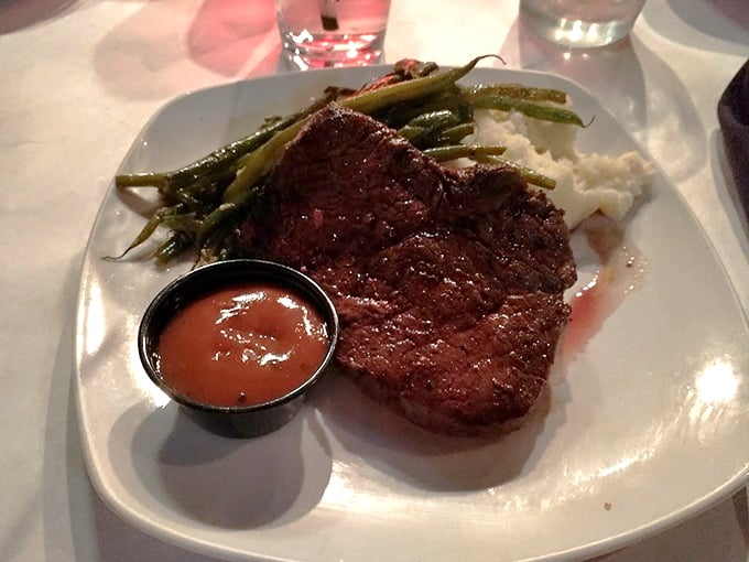 Behold the sirloin that launches road trips! Perfectly seared, served with green beans and mashed potatoes&mdash;this is steak worth crossing county lines for.