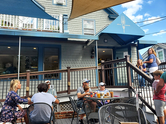 Local hangout alert! Outdoor dining at this blue-trimmed eatery is where islanders gather to swap stories over coffee and pastries.