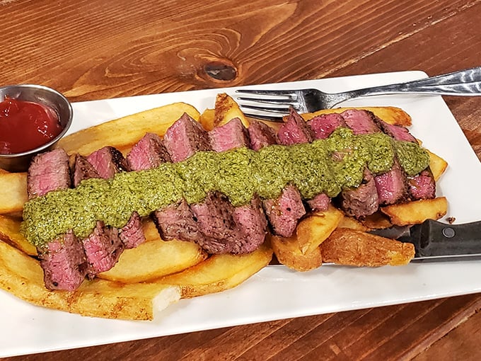Behold the star attraction: perfectly pink steak frites with vibrant chimichurri that'll make you contemplate licking the plate.