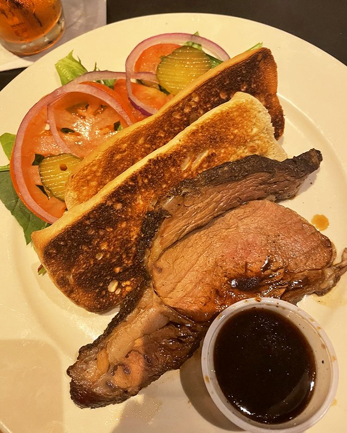This isn't just a sandwich; it's a love letter to beef. Tucker's prime rib sandwich comes with a side of au jus that you'll want to drink straight.