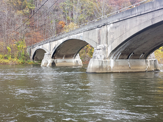This isn't just a bridge &ndash; it's a passage between eras, carrying both vehicles and stories across the gentle current below.